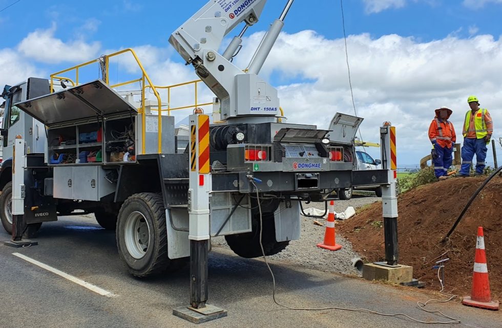 What is the safe and approved method for setting up an EWP on sloping ...